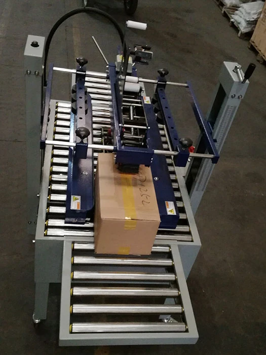 Migent | Cerradora semiautomática de cajas